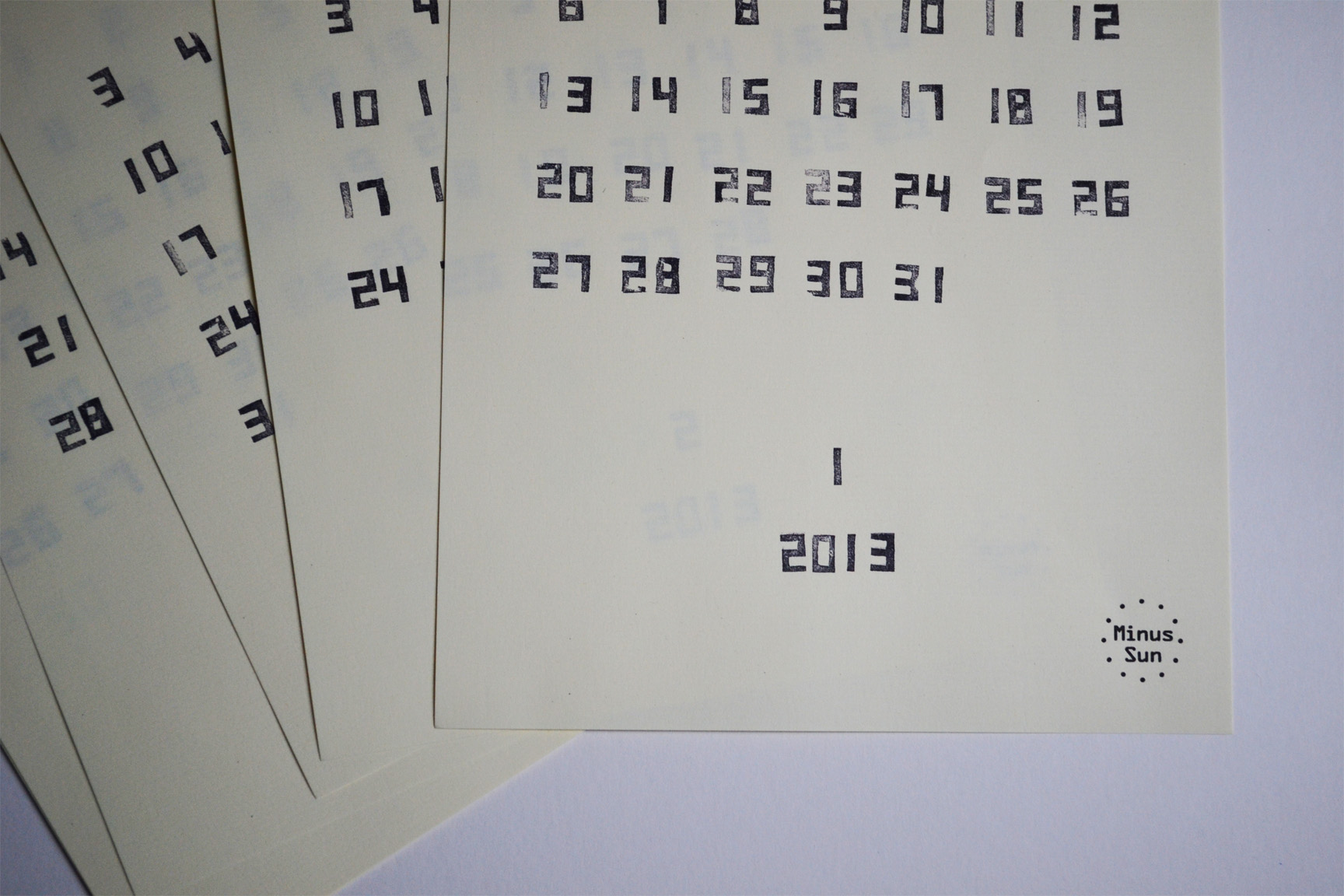 calendar in fabric frame - Minus Sun